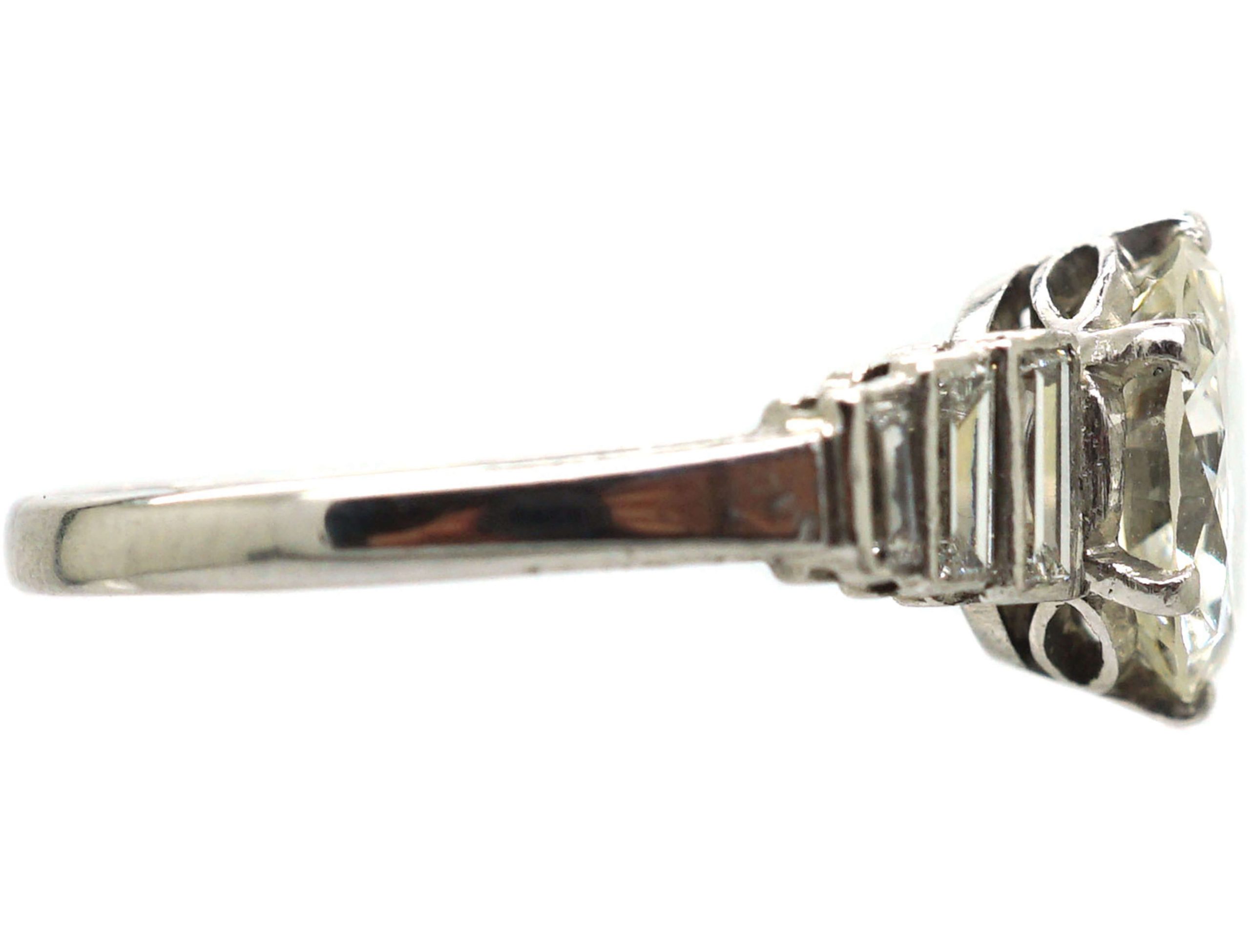Art Deco Platinum, Transitional Cut Diamond Solitaire Ring with Step Cut Shoulders set with ...