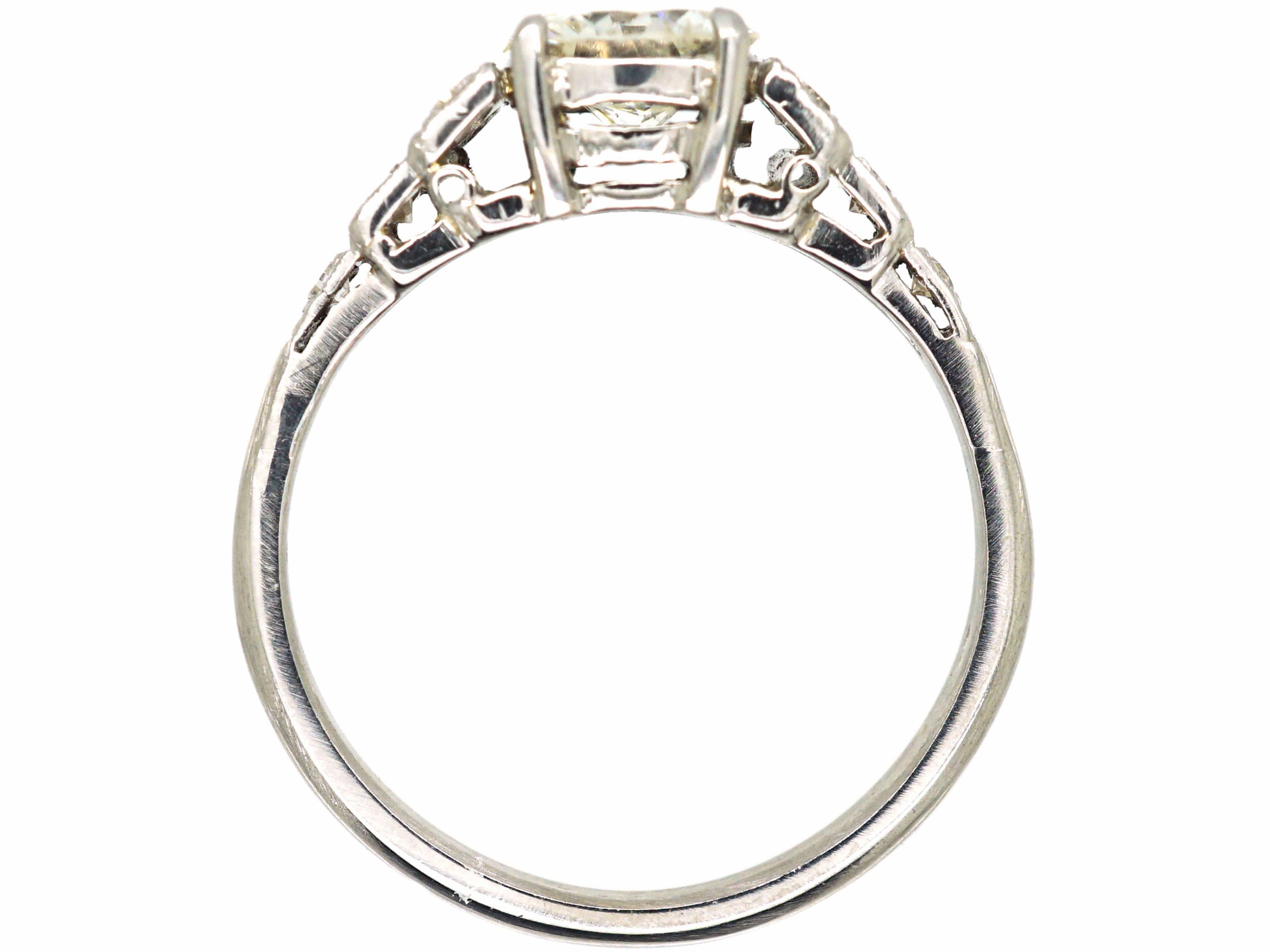 Art Deco Platinum Solitaire Diamond Ring with Step Cut Shoulders set ...