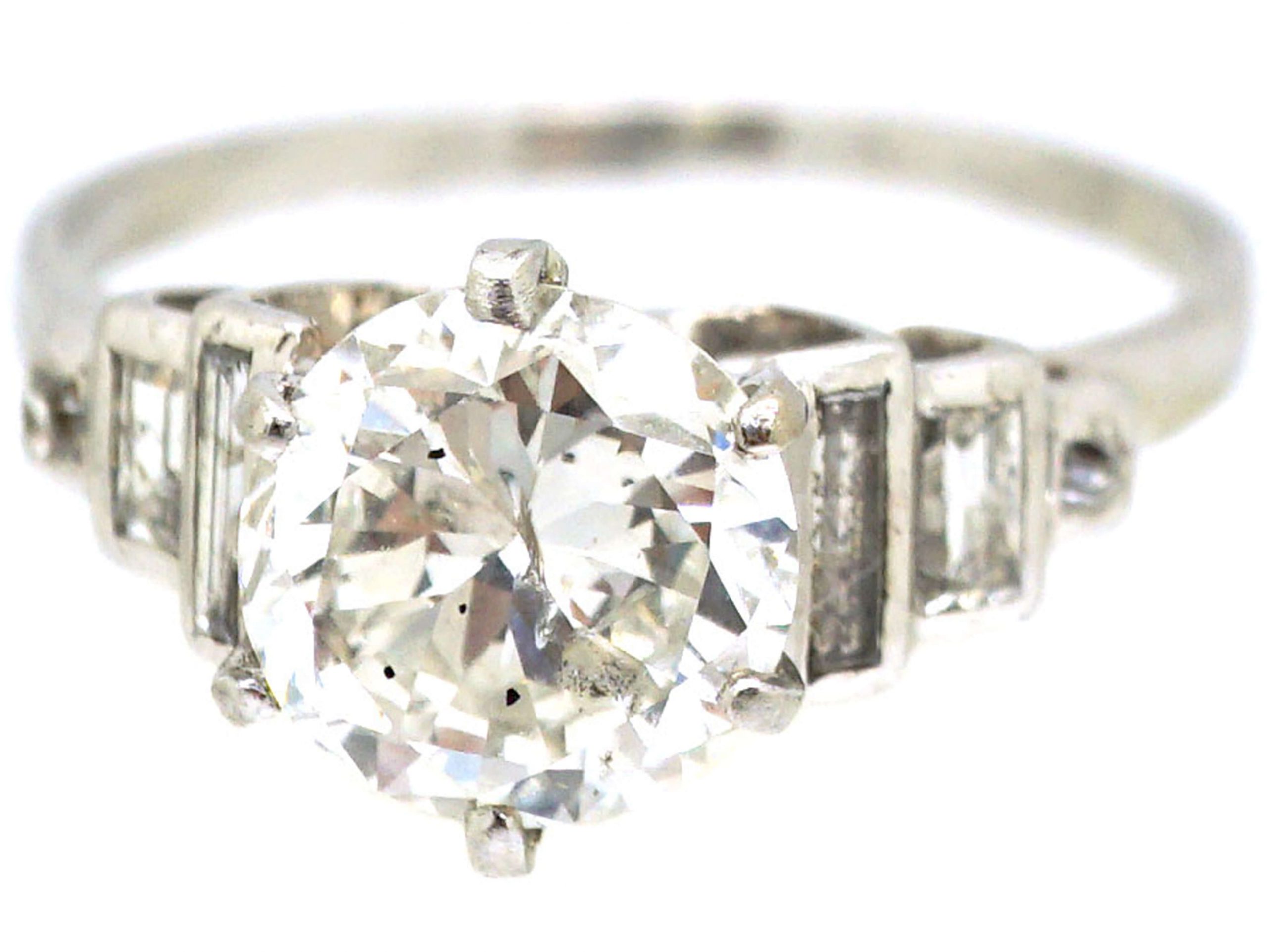 Art Deco Platinum Diamond Solitaire Ring with Step Cut Baguette Diamond ...
