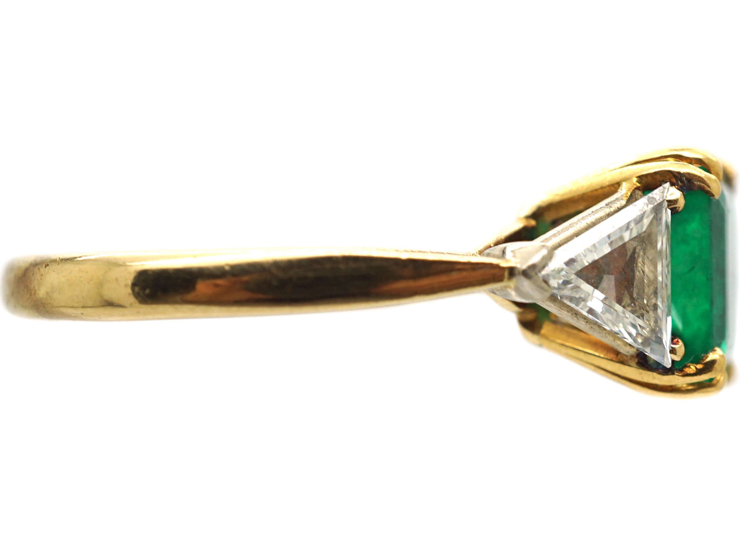 18ct Gold Ring set with an Emerald with a Triangular Cut Diamond on ...