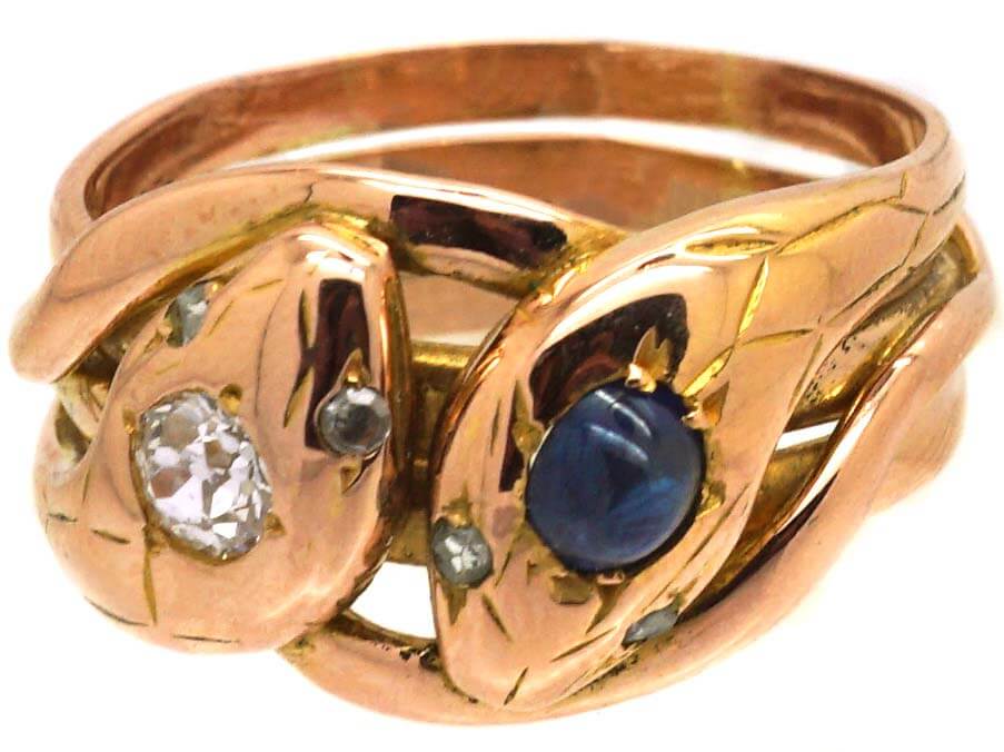 Late 19th Century Double Snake Ring set with a Diamond and a Cabochon ...
