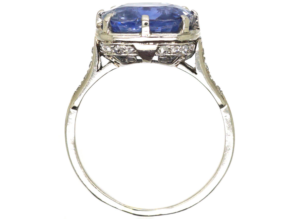 Early 20th Century Platinum Ring set with a Large Sapphire with Diamond ...